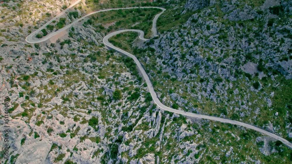 Video „Cars, buses and motorcycles drive on European curved road in ...