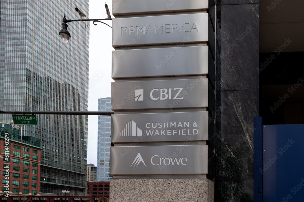 Chicago, IL, USA - March 29, 2022: A directory sign with company logos ...