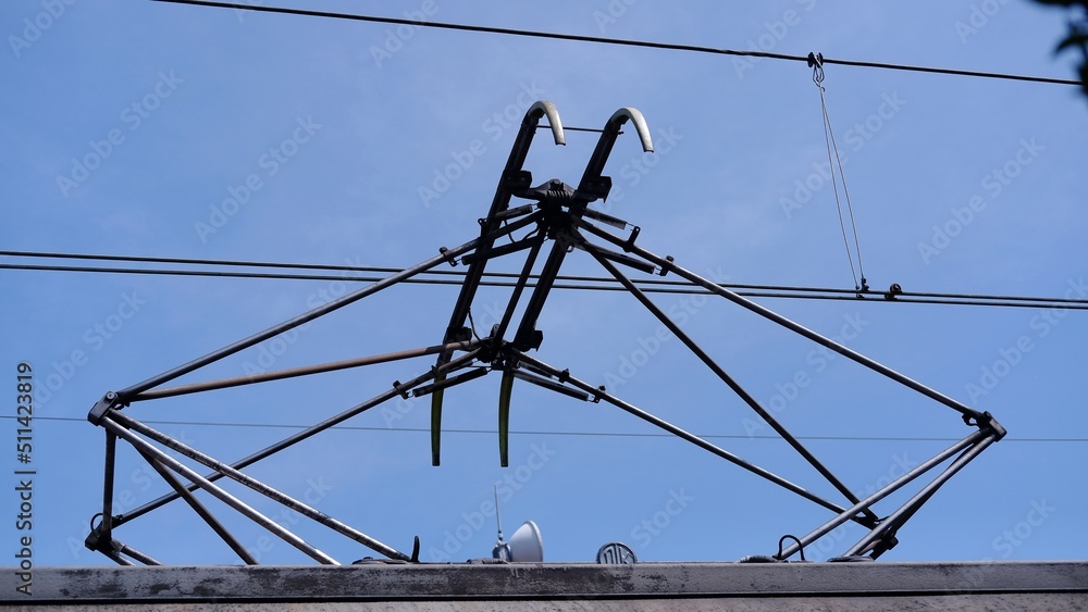 A pantograph or "pan" or "panto" is an apparatus mounted on the roof of ...