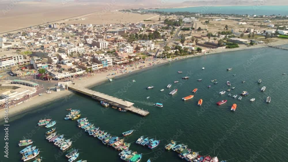 Paracas, Peru: Aerial drone footage of the Paracas town and harbor by ...