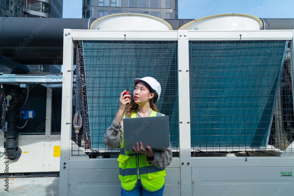 Engineer under checking the industry chilled water fan coil unit air ...