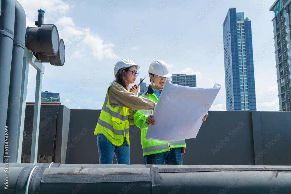 Engineer under checking the industry chilled water fan coil unit air ...