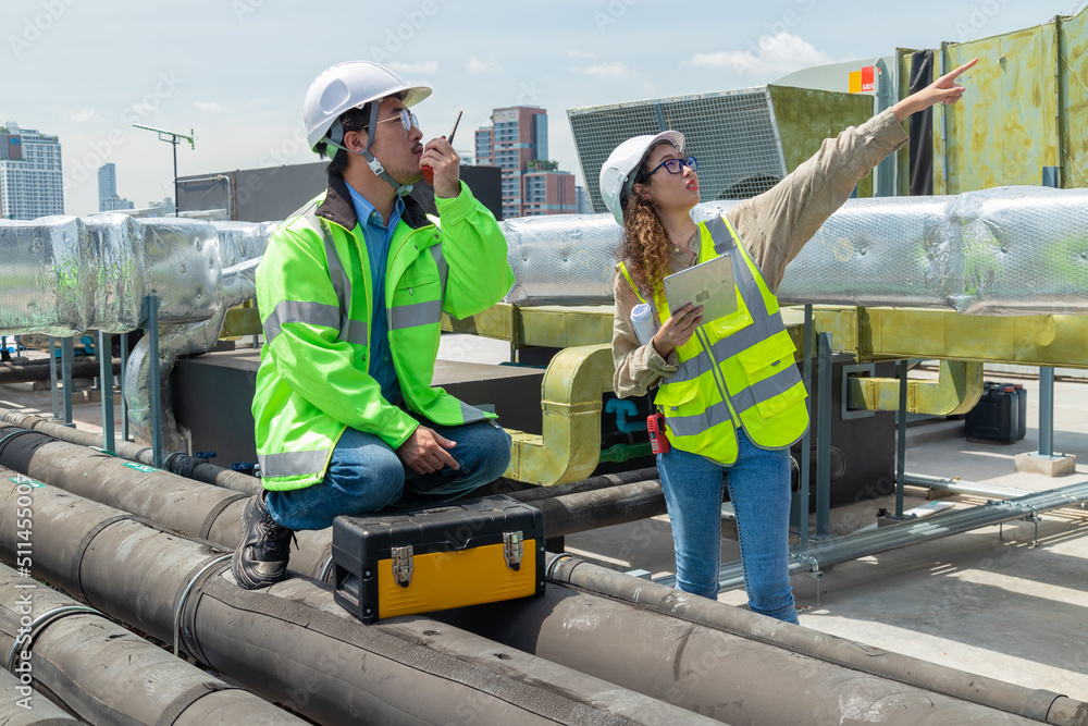 Engineer under checking the industry chilled water fan coil unit air ...