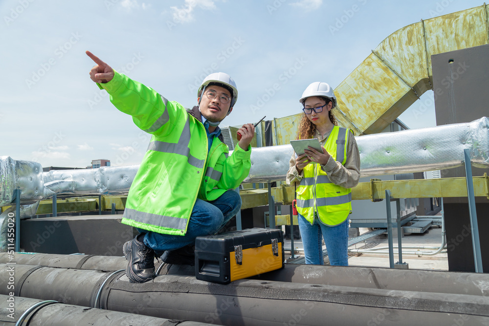 Engineer under checking the industry chilled water fan coil unit air ...