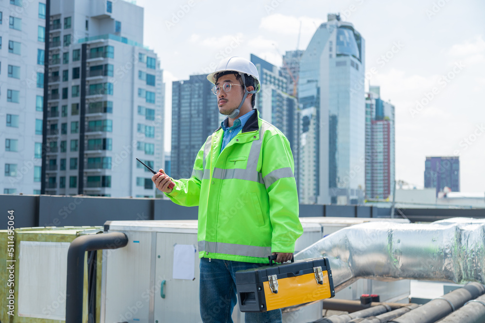 Engineer under checking the industry chilled water fan coil unit air ...
