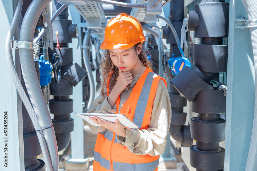Engineer under checking the industry chilled water fan coil unit air ...