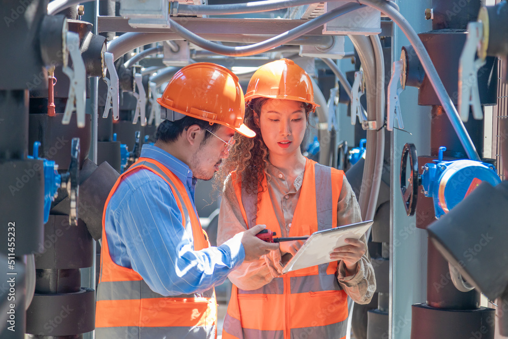 Engineer under checking the industry chilled water fan coil unit air ...