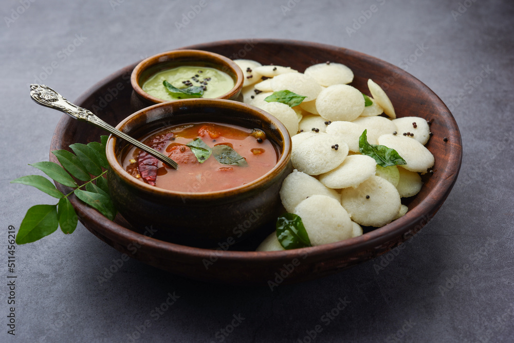 Mini idli is the smaller version of soft and spongy round shaped ...