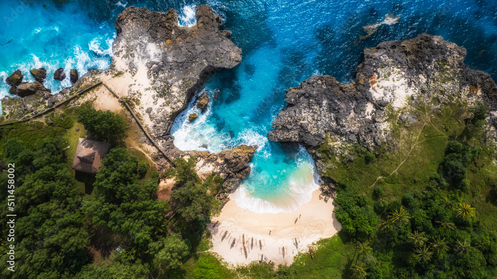 The Top view of Pantai Mandorak beach with the blue ocean on Indonesia ...