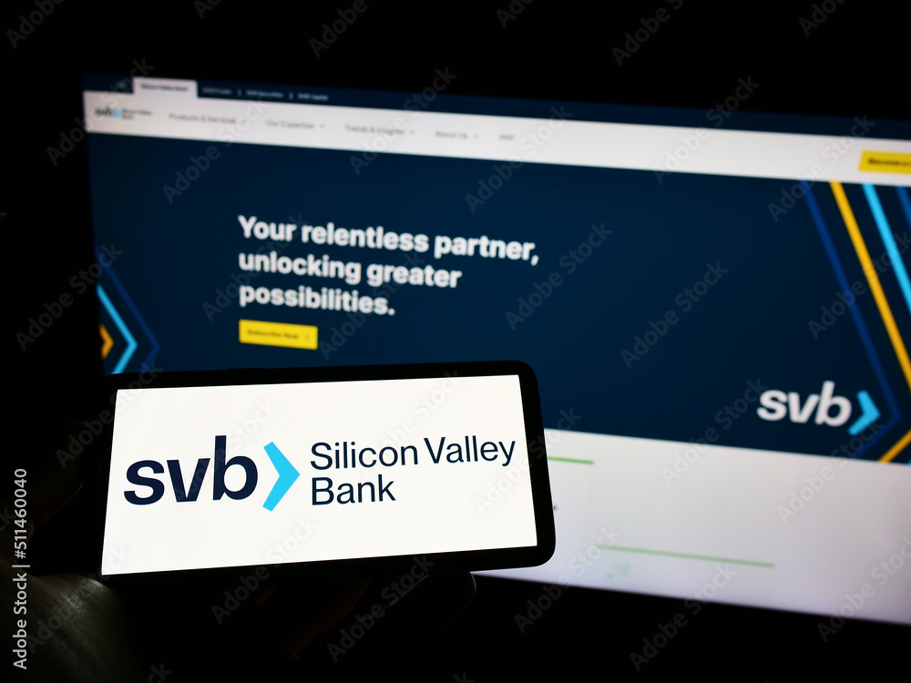 Stuttgart, Germany - 06-12-2022: Person holding mobile phone with logo ...