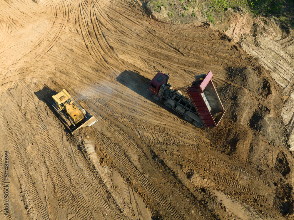 Bulldozer at mine reclamation once mining sand is completed. Land ...