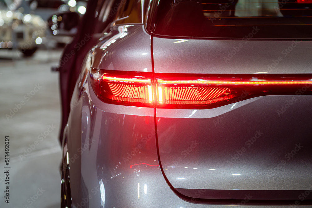 LED rear lights and car design closeup of nev fully electric Renault ...