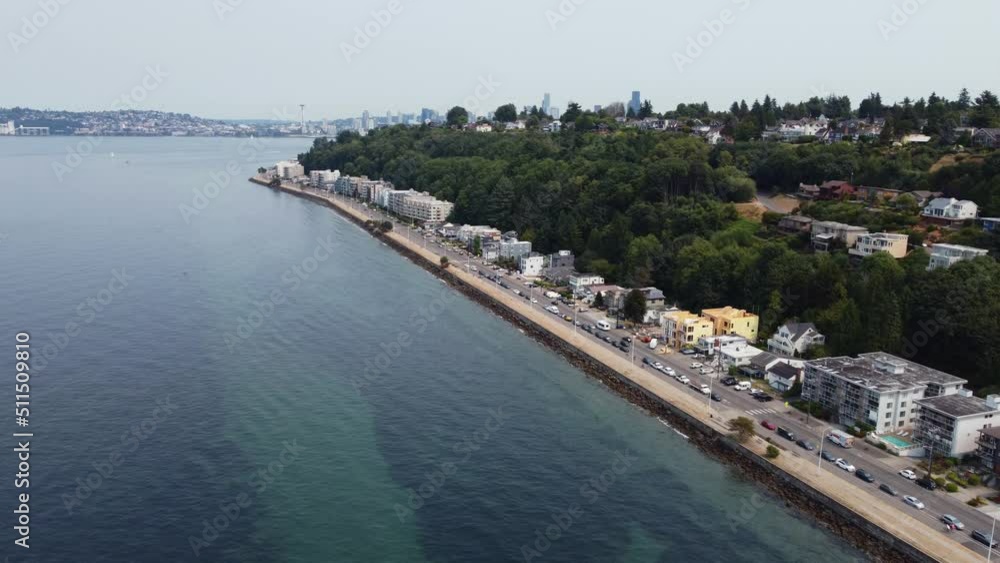 Drone shot revealing the city of Seattle, along with skyscrapers and ...