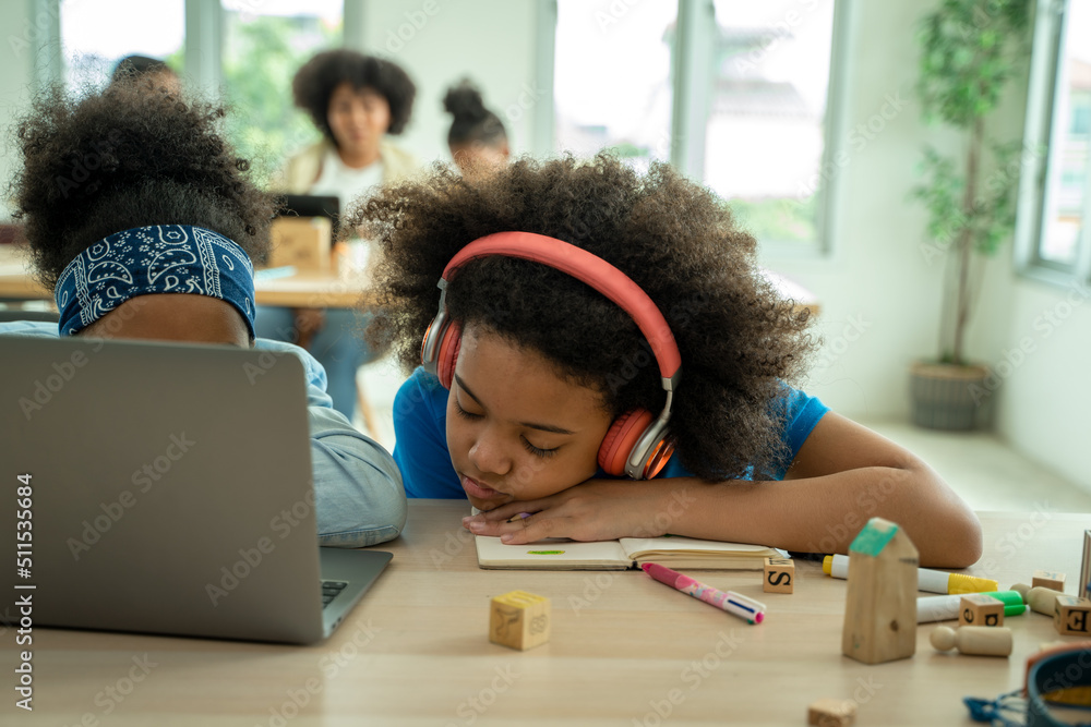 Elementary school students sleep in the classroom,Portrait of tired ...