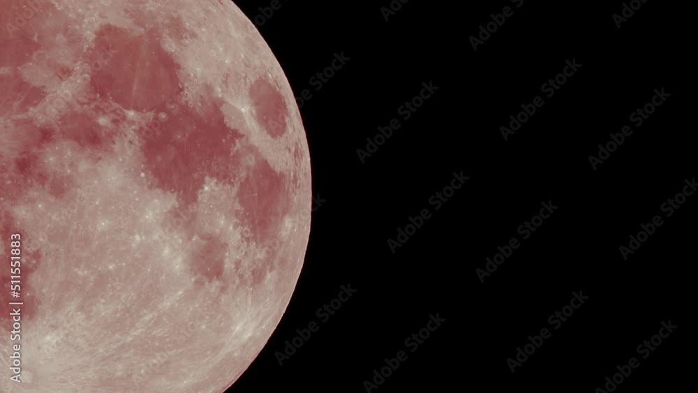 Full red moon moves fast at night sky. Sharp footage of full moon with ...