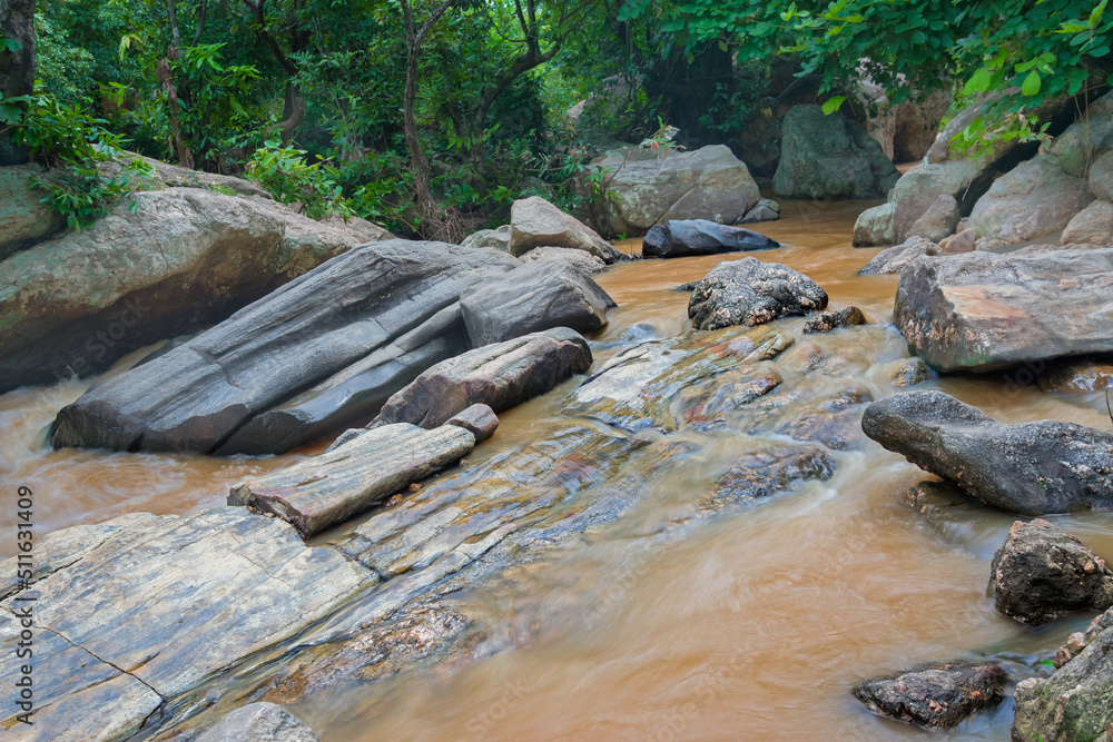 Beautiful Bamni waterfall having full streams of water flowing downhill ...