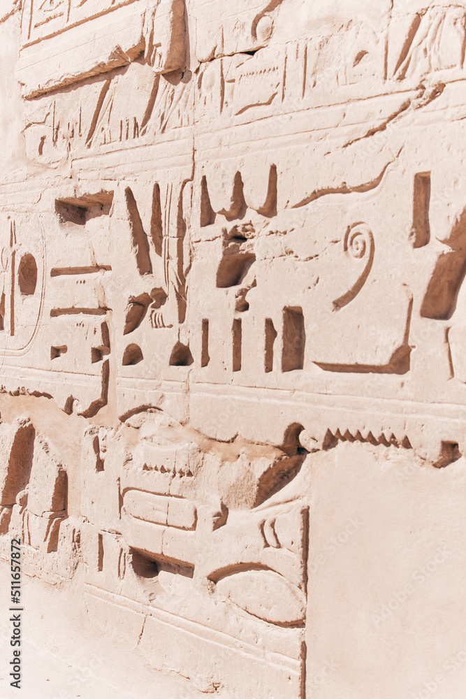 Real ancient Egyptian Ankh hieroglyphics engraved in a stone wall at ...