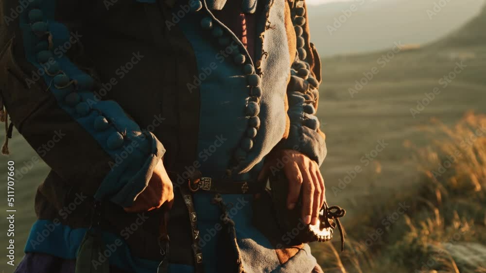 Portrait of a sad medieval warrior whose hair is blowing in the wind ...