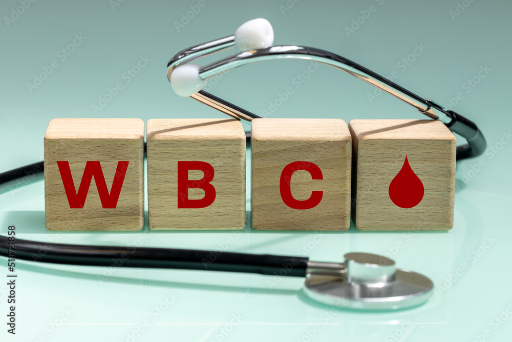 wooden blocks with the words WBC, white blood cells, count, corpuscles ...