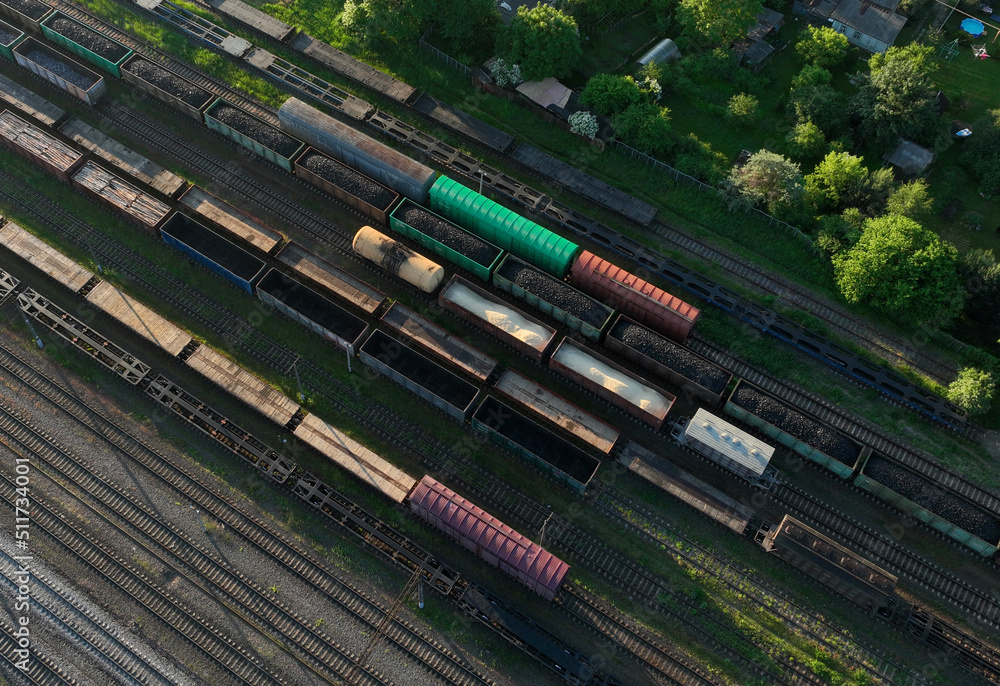 Railway yard with freight rail wagons. Cargo trains with goods on ...