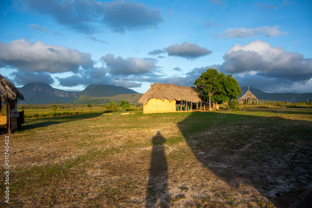 Community of the Pemon Indians in the Canaima National Park. thatched ...