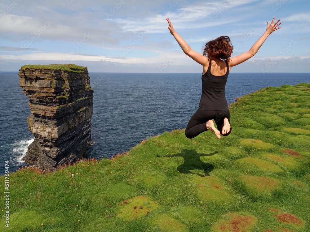 Zero gravity Girl cliff jumping Dun Briste Downpatrick Head Ireland ...