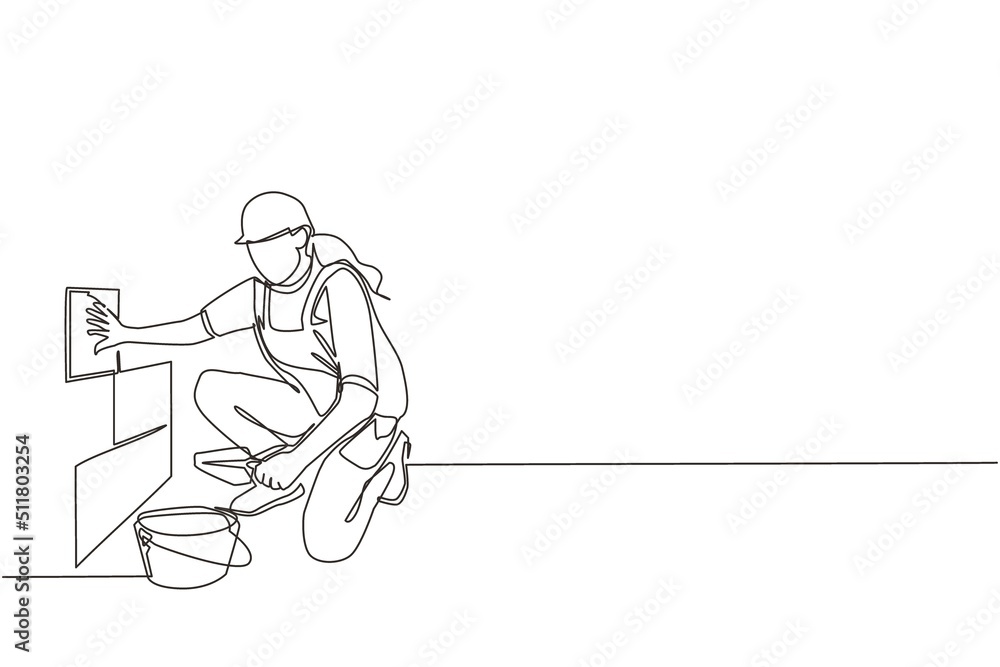 Single one line drawing repair worker laying ceramic wall tile ...