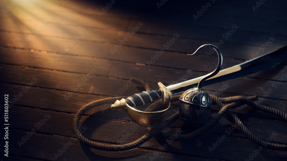 high contrast image of a pirate's cutlass sword and hook on a wood ...