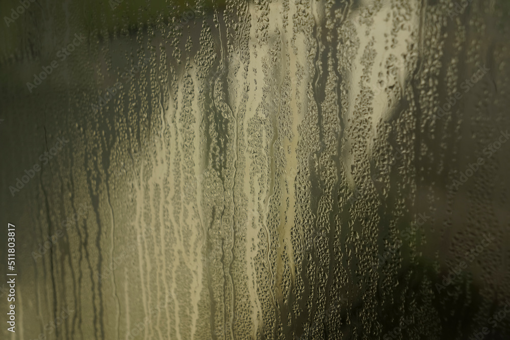 Close up of water rain droplet on glass dropped window. big rainy drop ...