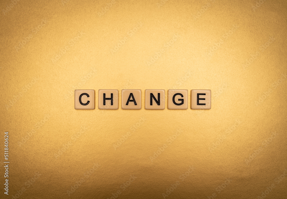 CHANGE Letters on golden background Stock Photo | Adobe Stock