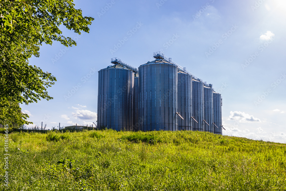 Agricultural silos granary tower. Large iron barrels of grain Stock ...