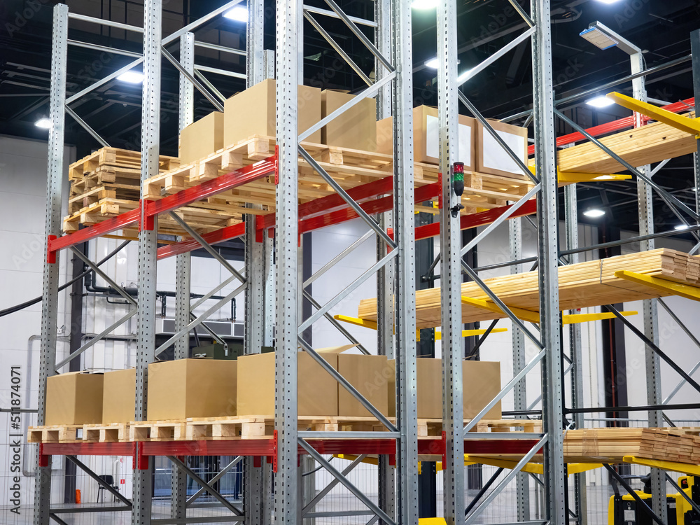 Shelving with boxes. Logistics warehouse without people. Shelves with ...