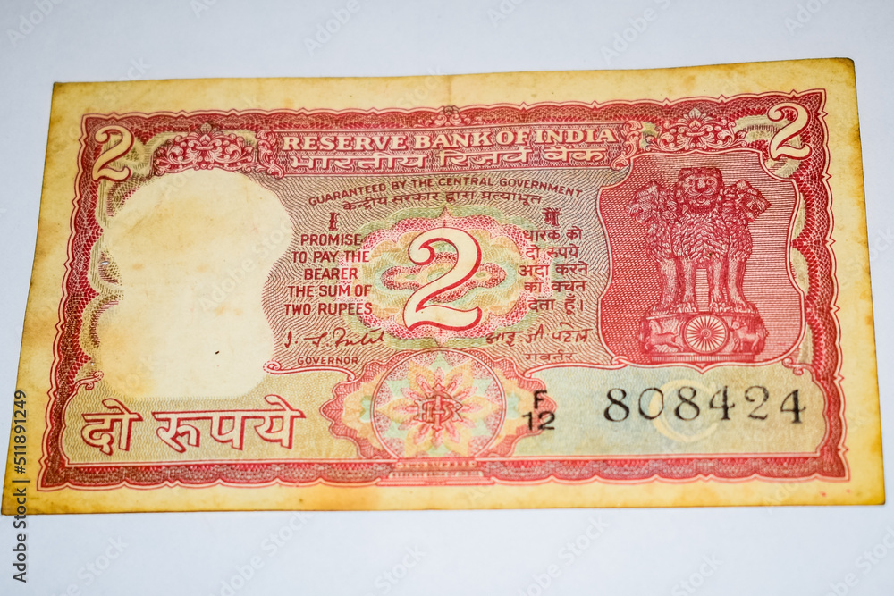 Old Two Rupee notes combined on the table, India money on the rotating ...