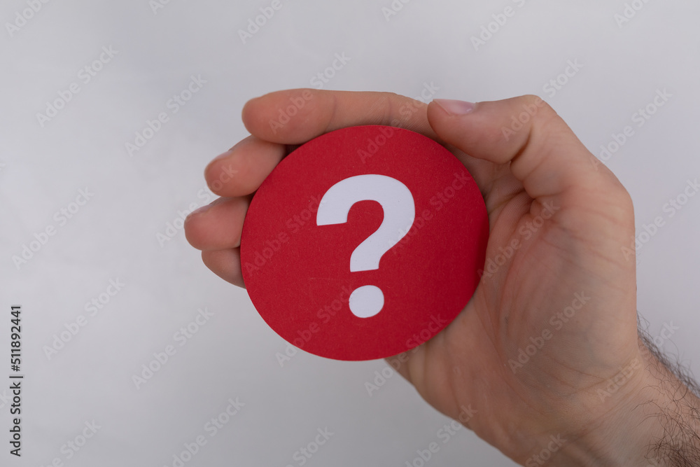 question marks on sheet of paper Stock Photo | Adobe Stock