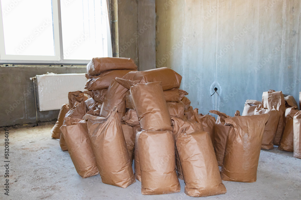 Cement bagBuilding mix bags. Delivery of cement and plaster for works ...