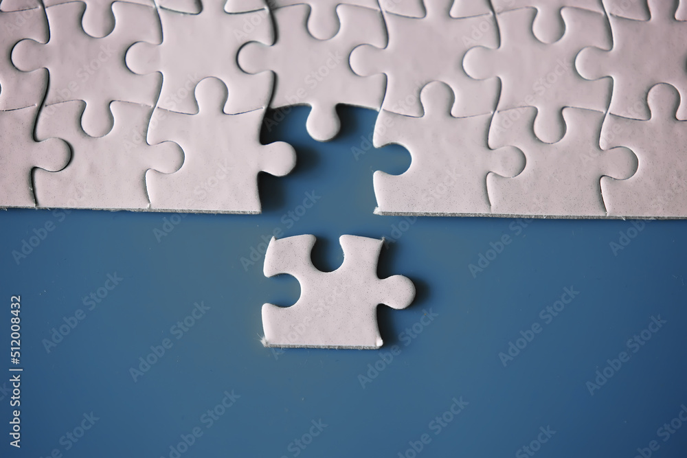 Clean puzzle elements on the red background. Empty puzzle piece on the ...