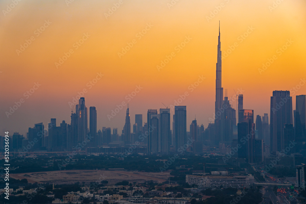 United Arab Emirates, Dubai, Tall skyline skyscrapers at moody dusk ...