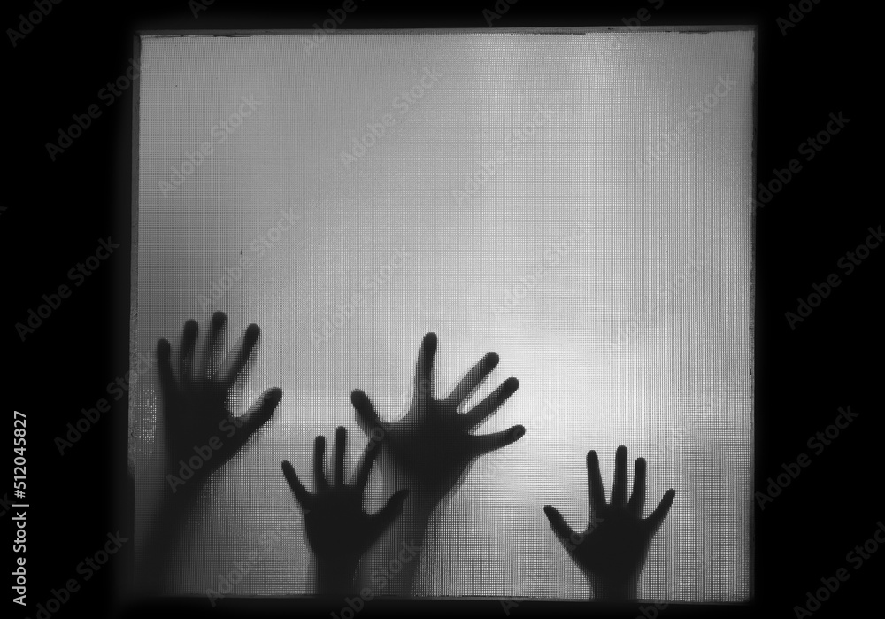 Shadowy figure hands behind glass - horror background Stock Photo ...