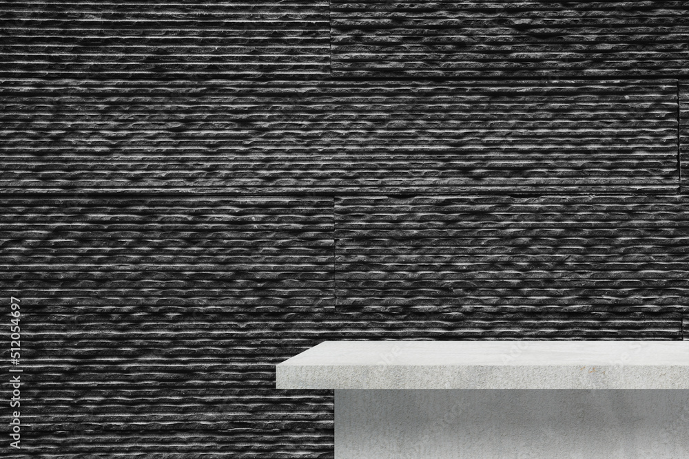 luxury of light gray concrete table with dark brick wall for interior ...
