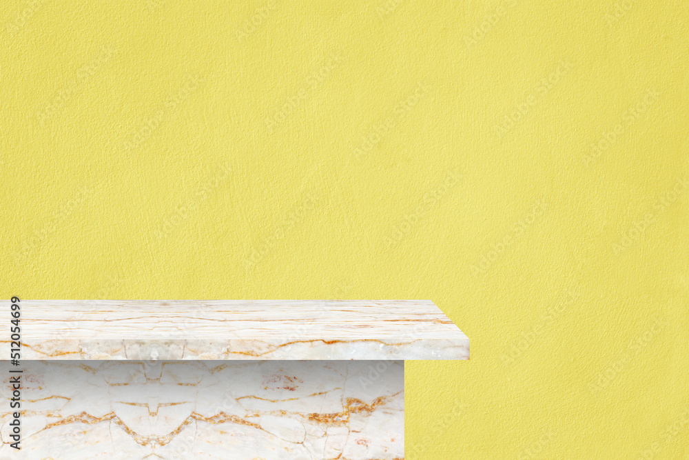 luxury of light marble table with bright yellow brick wall for interior ...