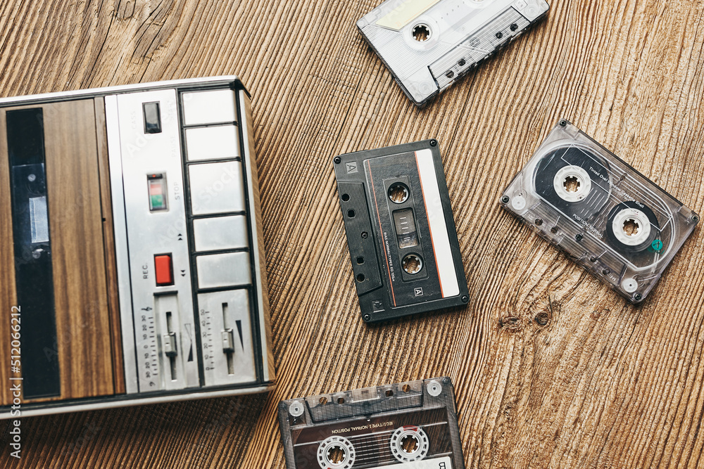 Compact cassette tapes and cassette recorder. Retro music style. 80s ...