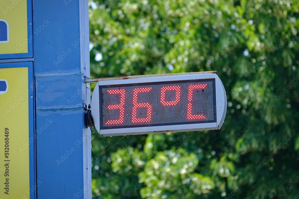 Street thermometer marking 36 degrees celsius in summer Stock Photo ...