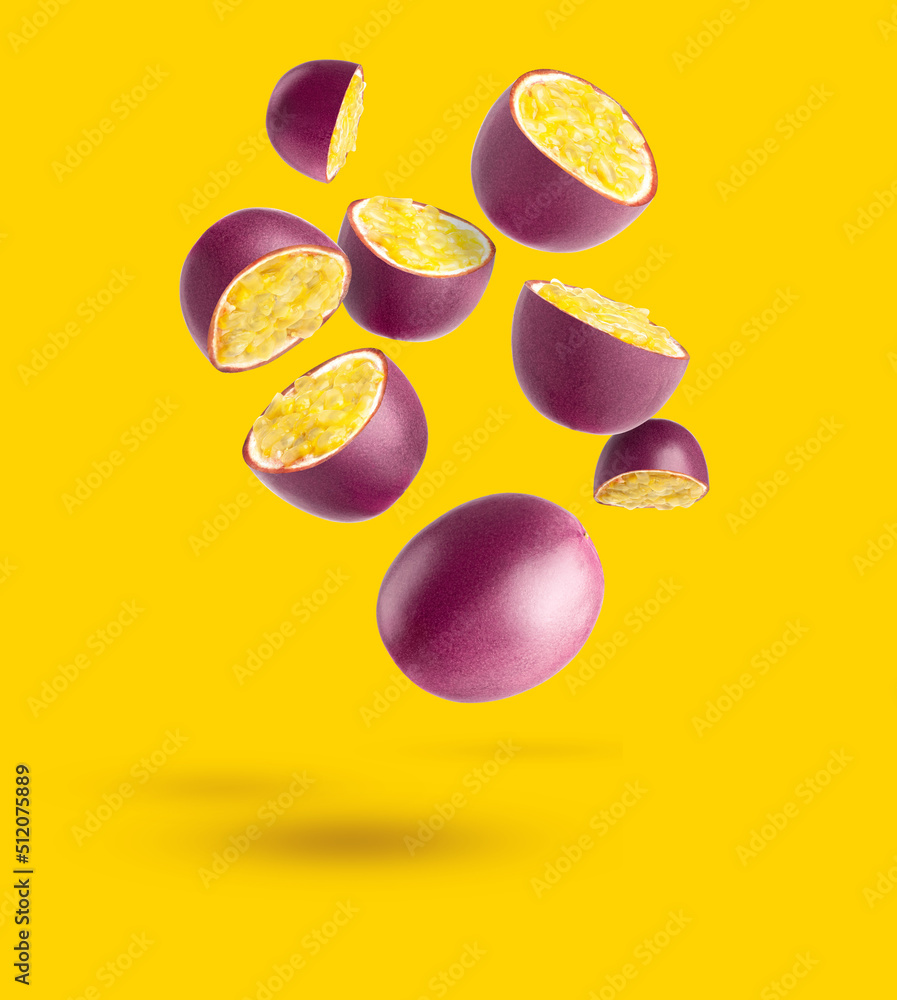 Passion fruit. Pieces of flying fruit. Purple fruits with yellow seeds ...