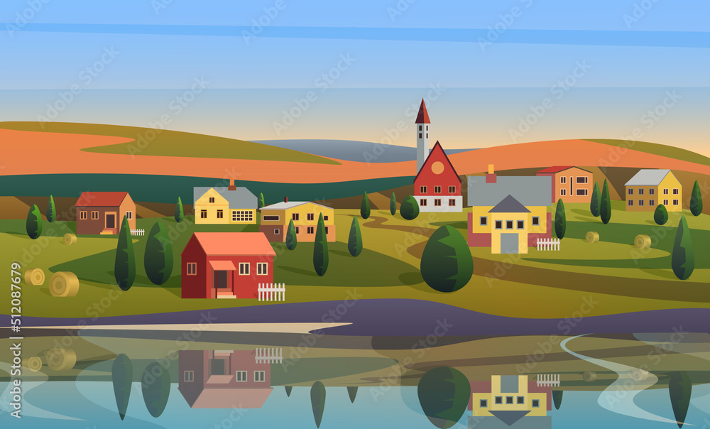 European village or small town in countryside landscape at sunrise ...