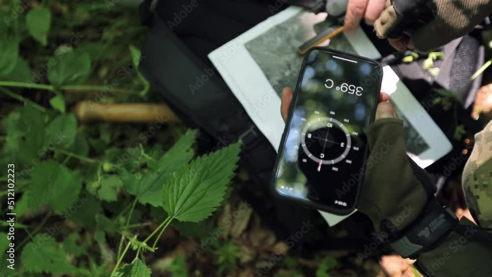 military soldiers officers of ukraine look at the map and compass from ...