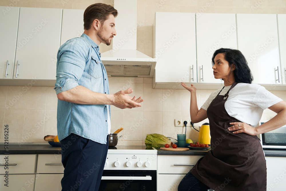 Young family couple having argument at home Stock Photo | Adobe Stock