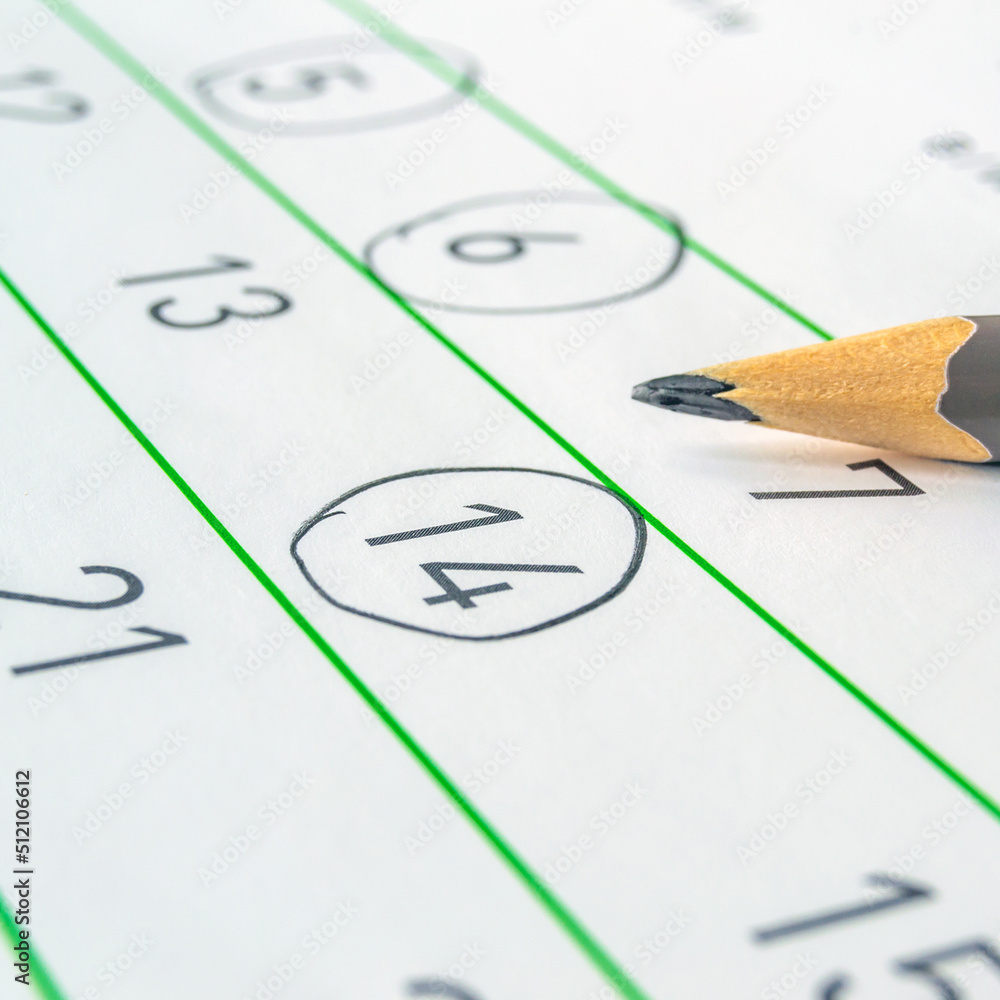 perspective view of a calendar sheet with marked dates. planning a ...