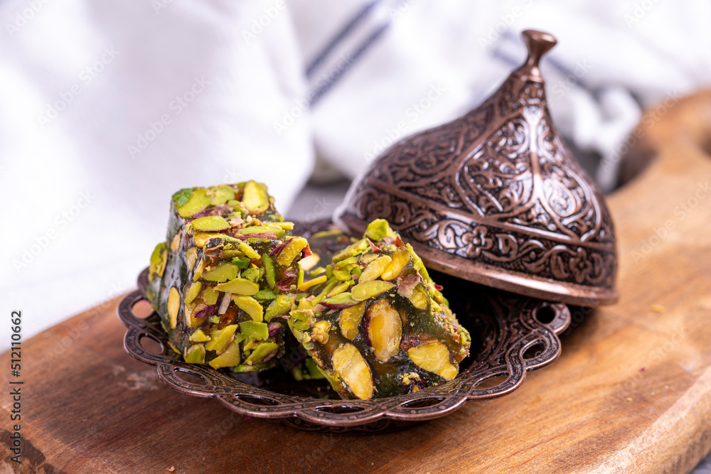 Turkish Delight with Pistachio on a dark background. Traditional ...