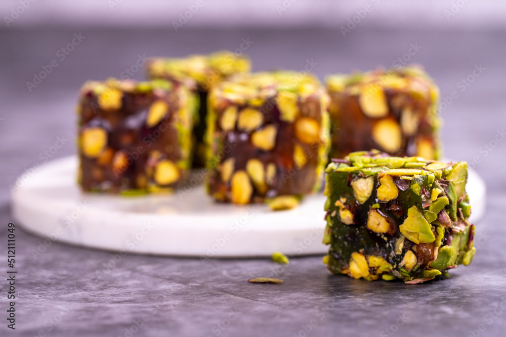 Turkish Delight with Pistachio on a dark background. Traditional ...