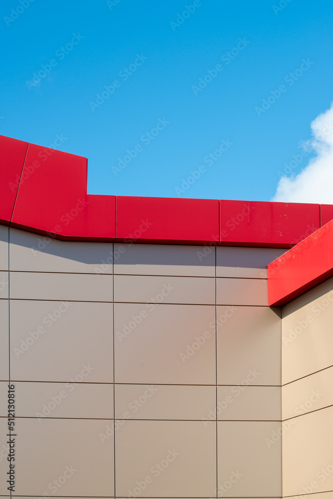 The exterior wall of a contemporary commercial style building with ...